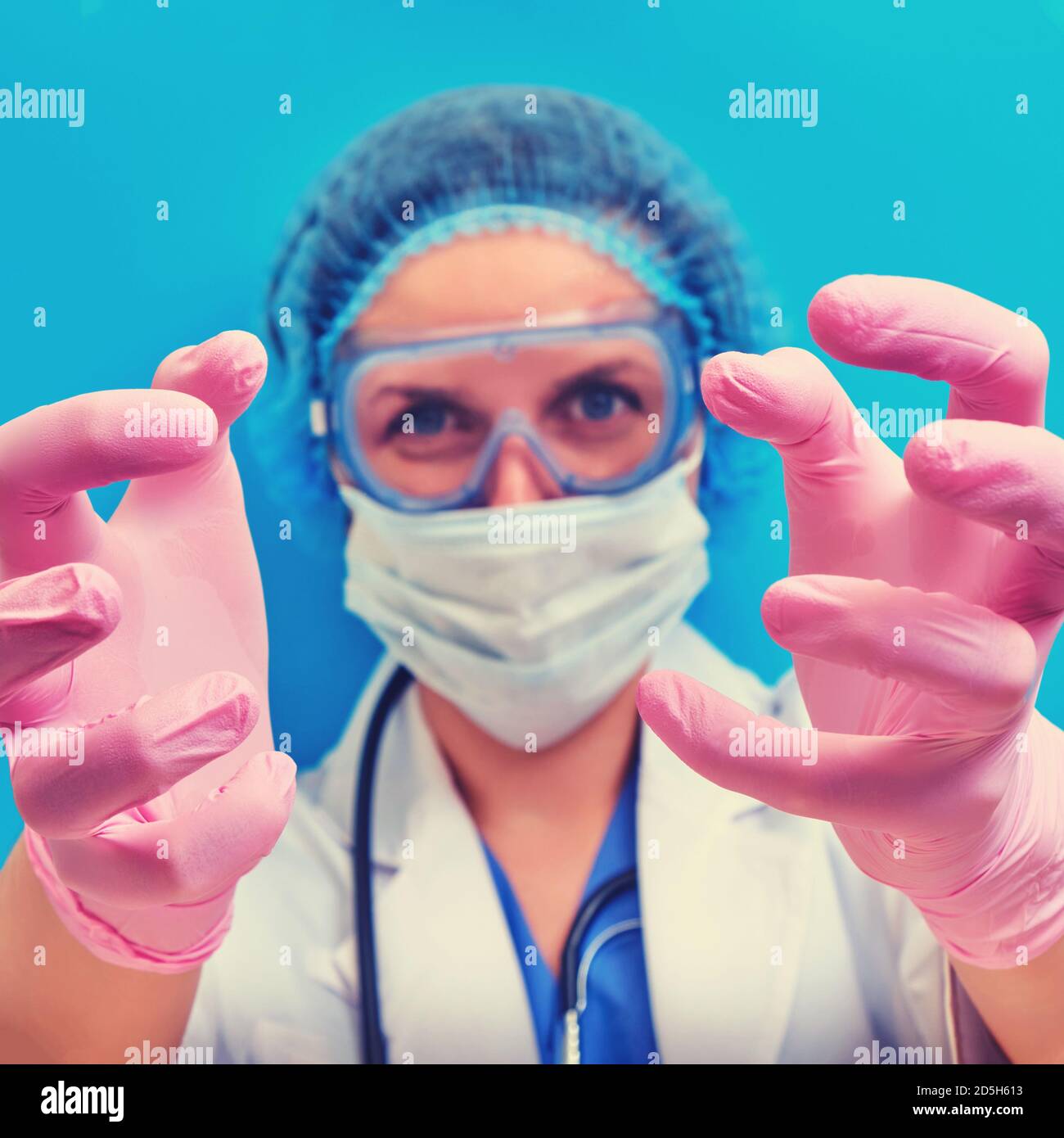 Hands of a doctor with an angry look are drawn to the patient as in a ...