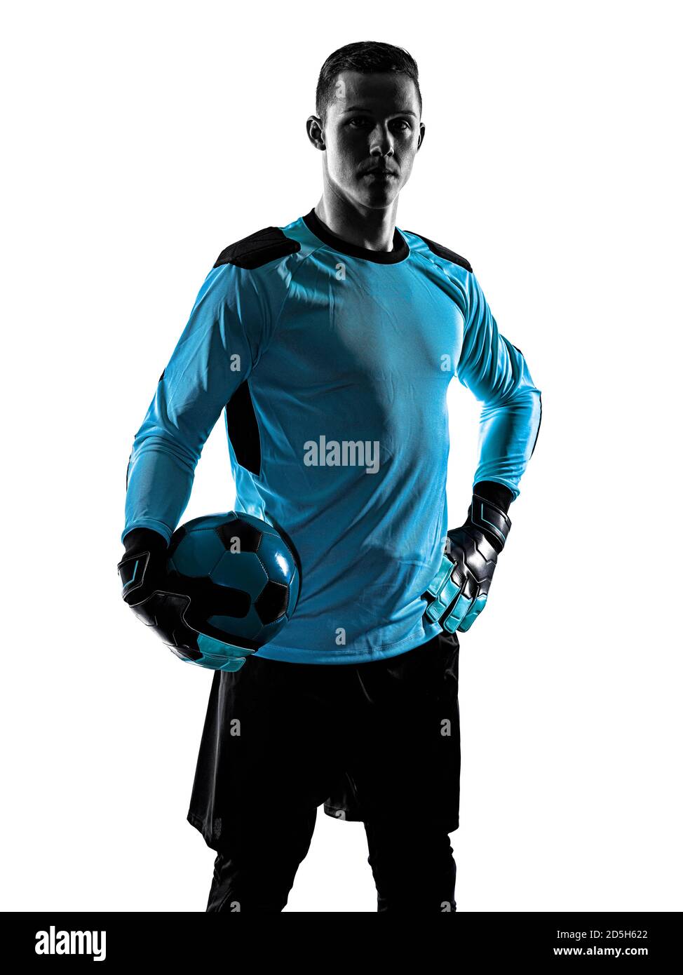 one caucasian soccer player goalkeeper man in studio silhouette shadow ...