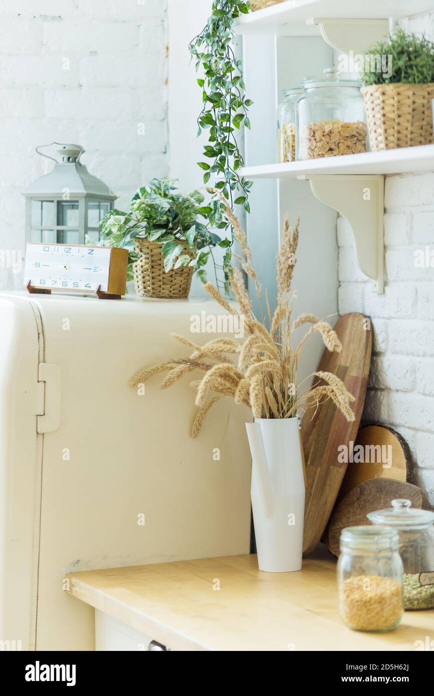 Kitchen at home with white modern interior and cream colour ...