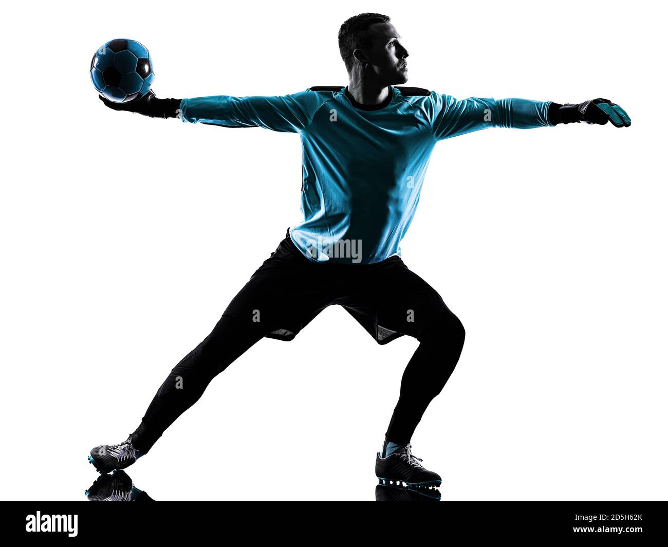 one caucasian soccer player goalkeeper man in studio silhouette shadow ...