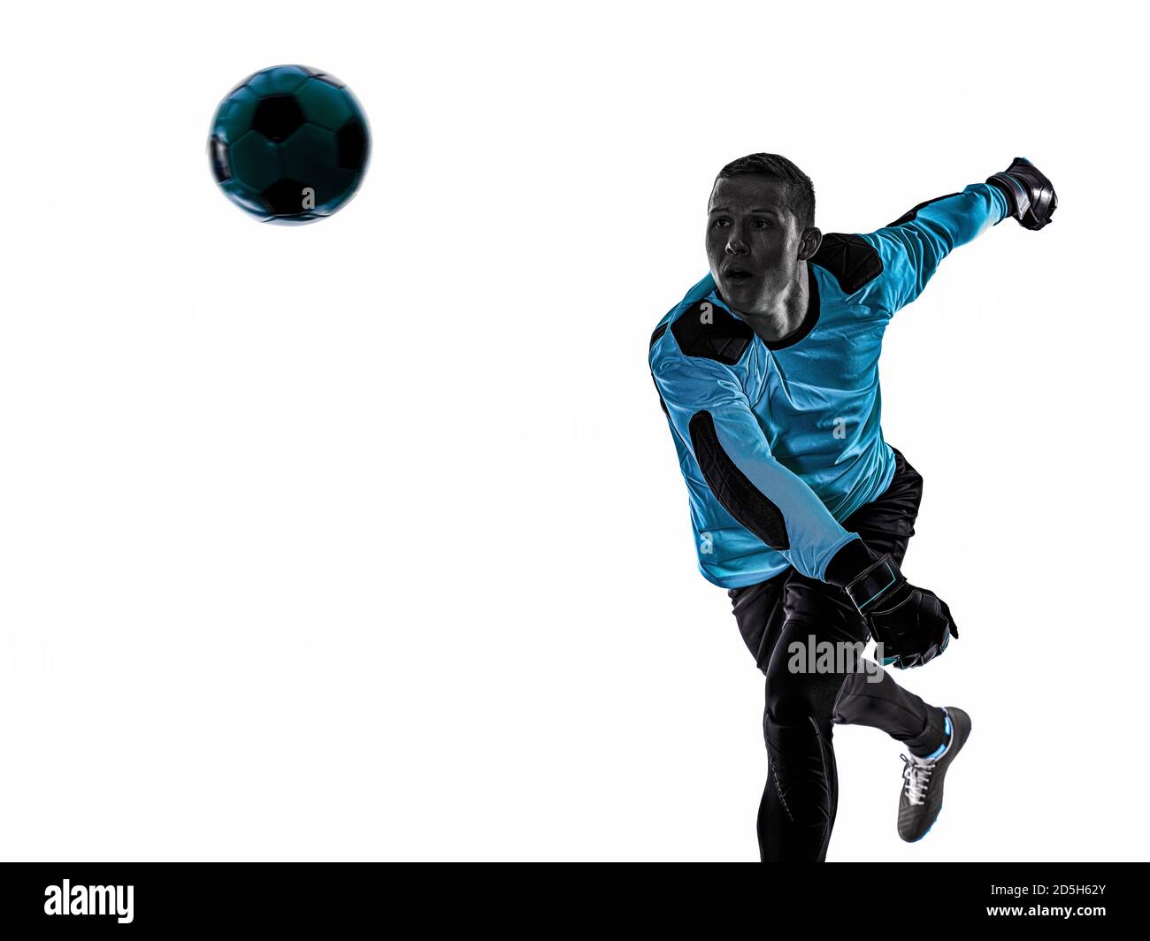 one caucasian soccer player goalkeeper man in studio silhouette shadow ...