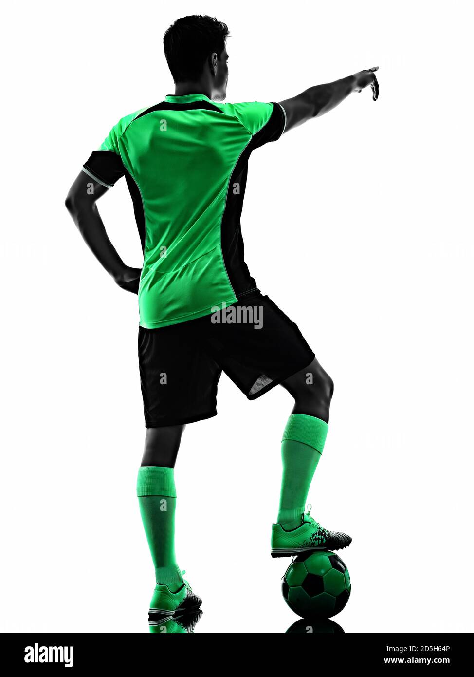 one young caucasian soccer player silhouette shadow in studio isolated ...