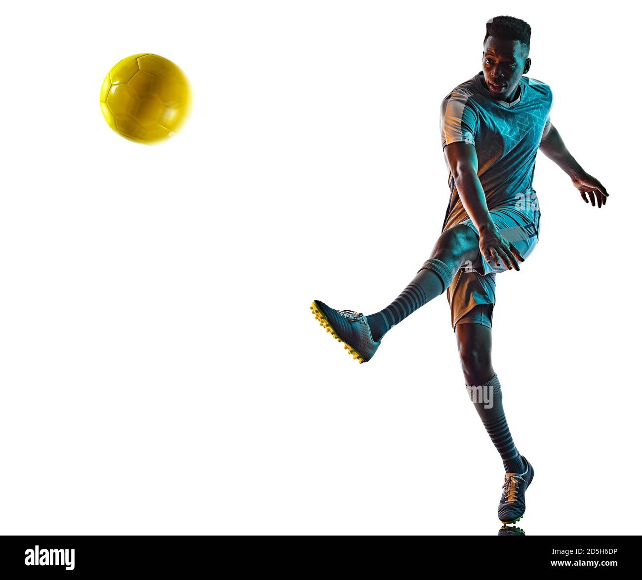 young african soccer player man in studio isolated on white background ...