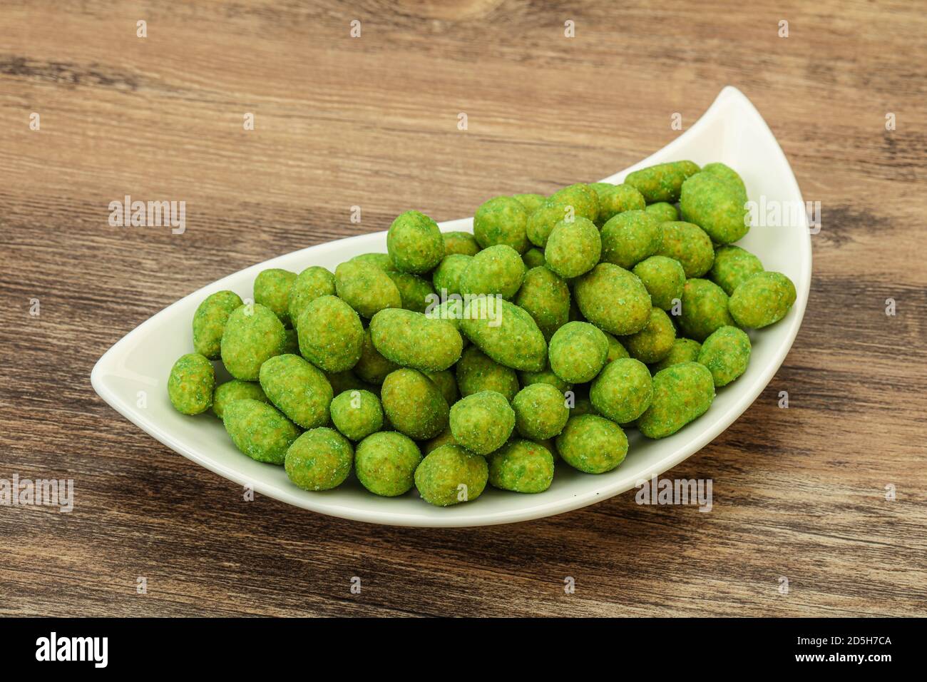 Spicy wasabi peanuts snack in the bowl Stock Photo - Alamy