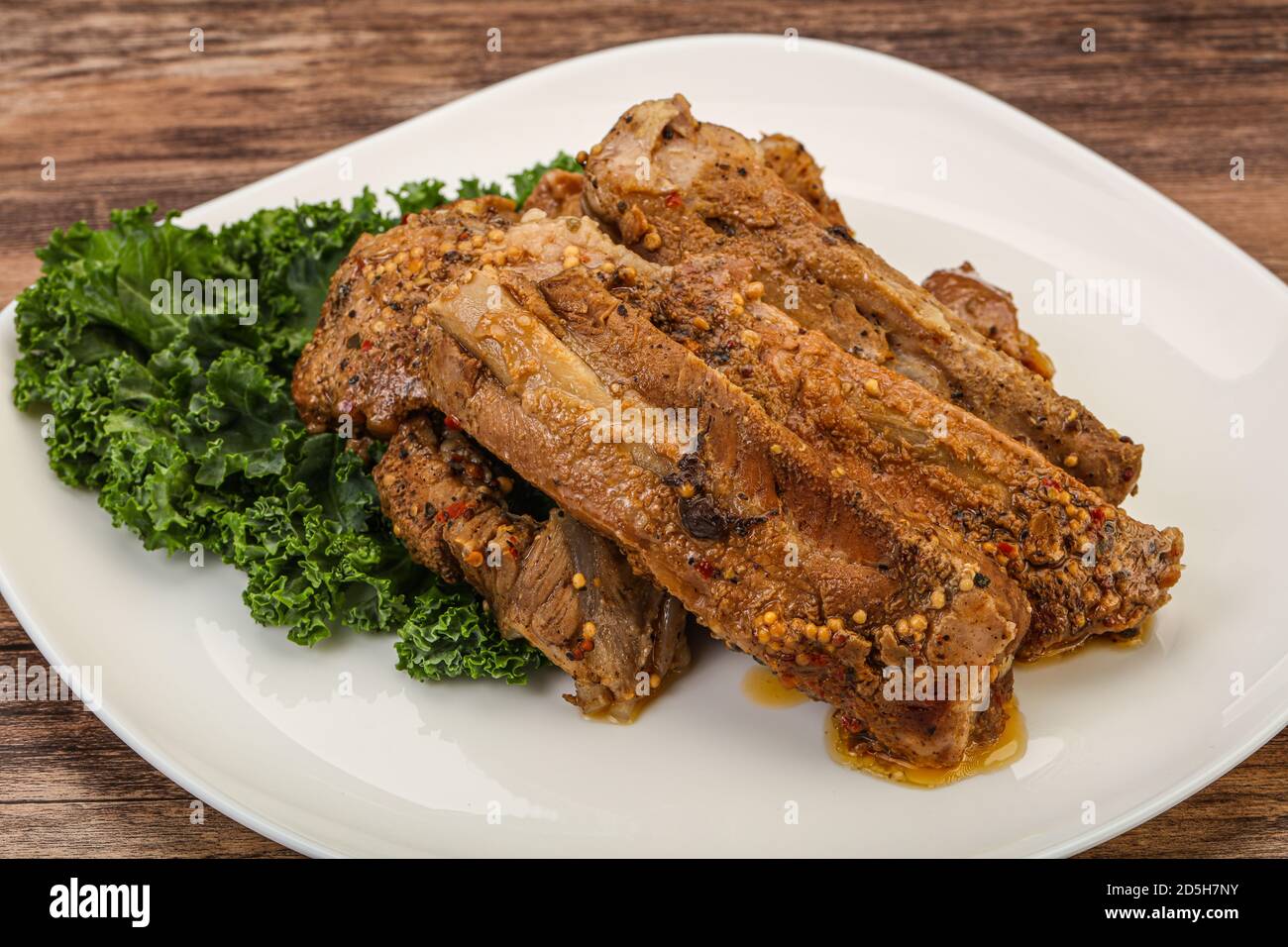Stewed pork ribs with spices and herbs Stock Photo - Alamy