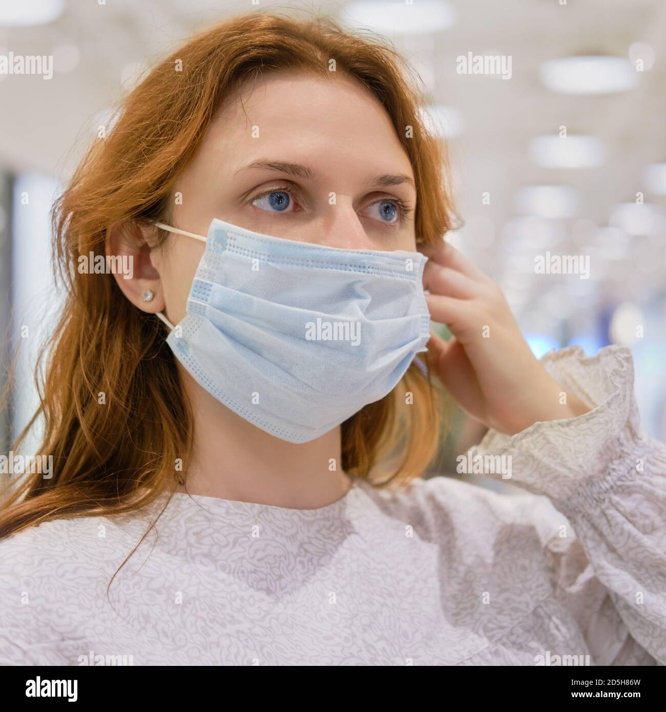 Woman medical mask removed hi-res stock photography and images - Alamy