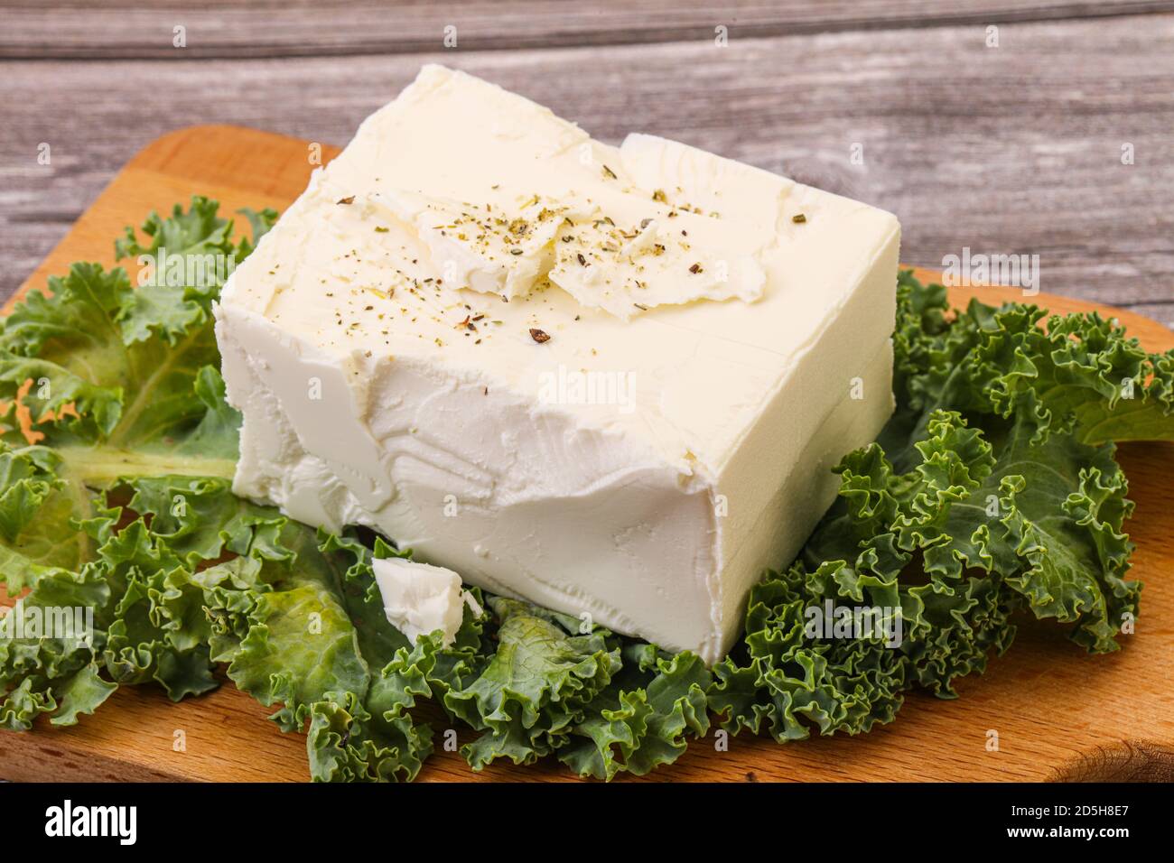 Traditional tasty Greek Feta soft cheese brick Stock Photo - Alamy