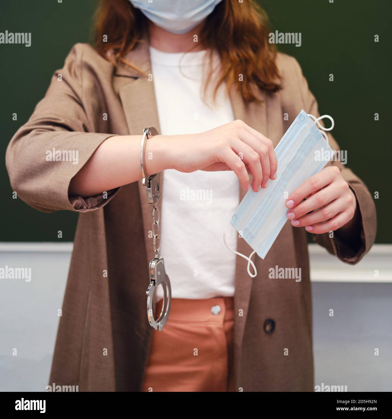 Woman handcuff hi-res stock photography and images - Alamy