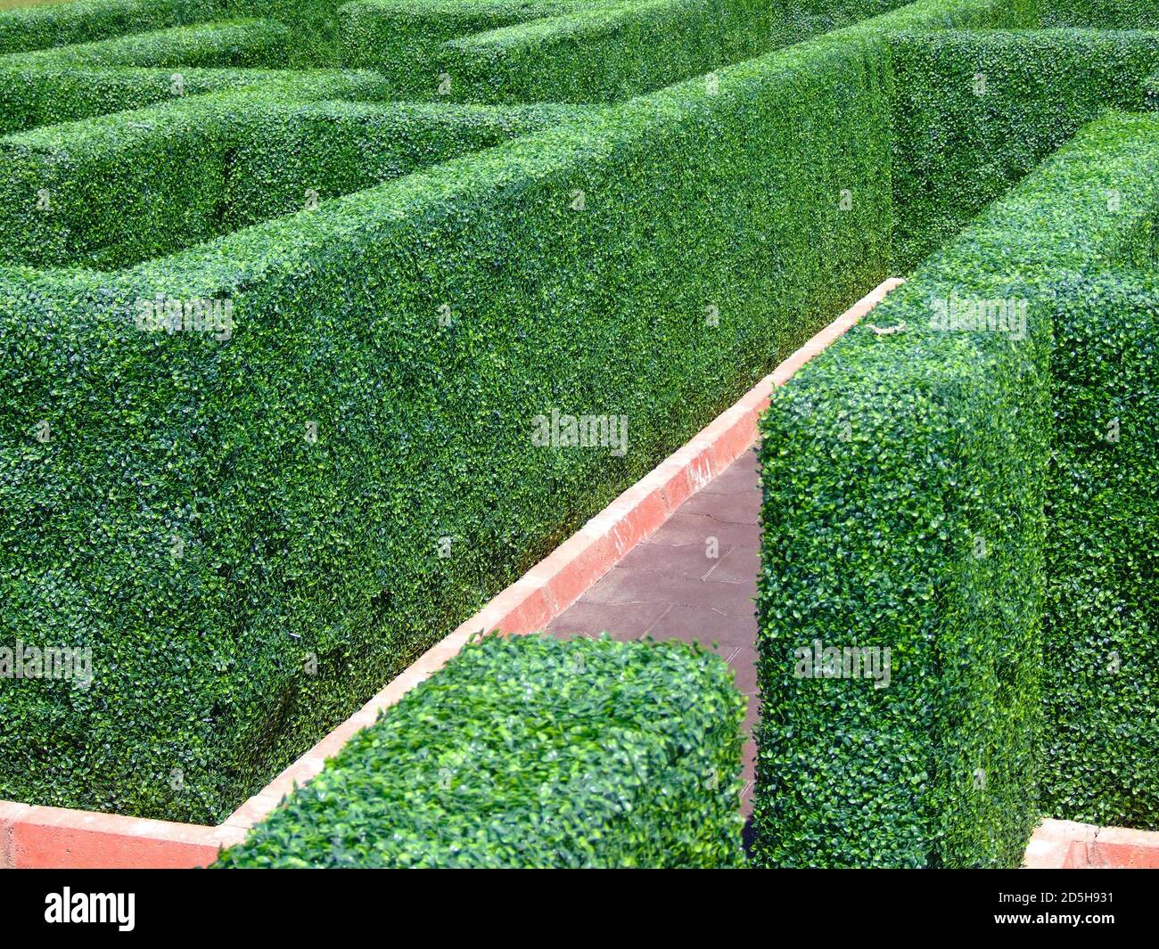 Big Maze Pattern Labyrinth in Green Garden Park Stock Photo - Alamy