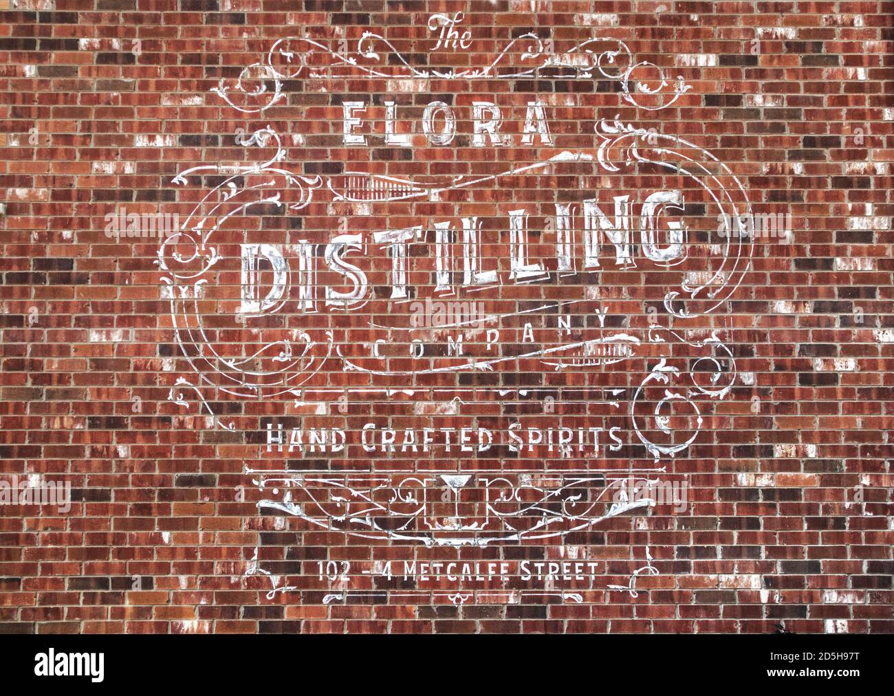 The logo of The Elora Distilling Co., on the external brick wall of the ...
