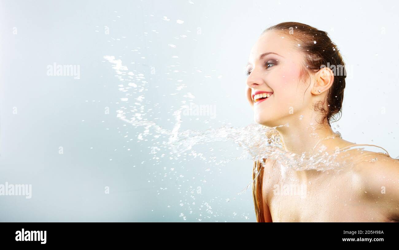 pretty woman with water splash. Beautiful model woman with a splash of ...