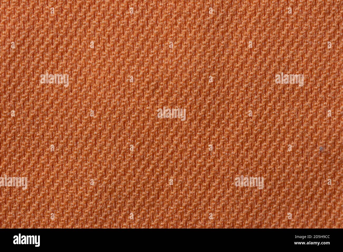 Orange woven fabric texture Stock Photo - Alamy