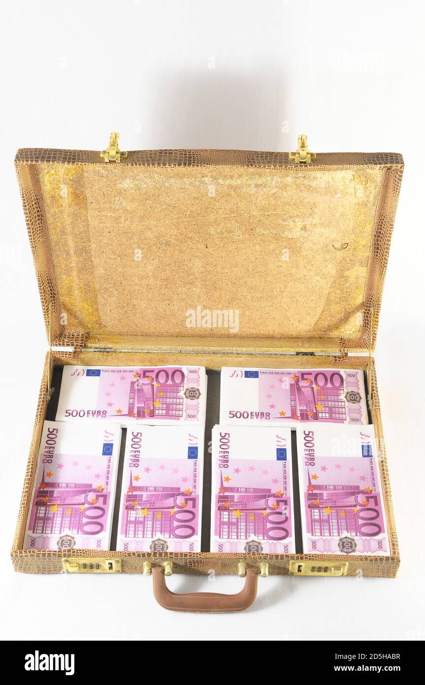 Suitcase Full of Banknotes Stock Photo - Alamy