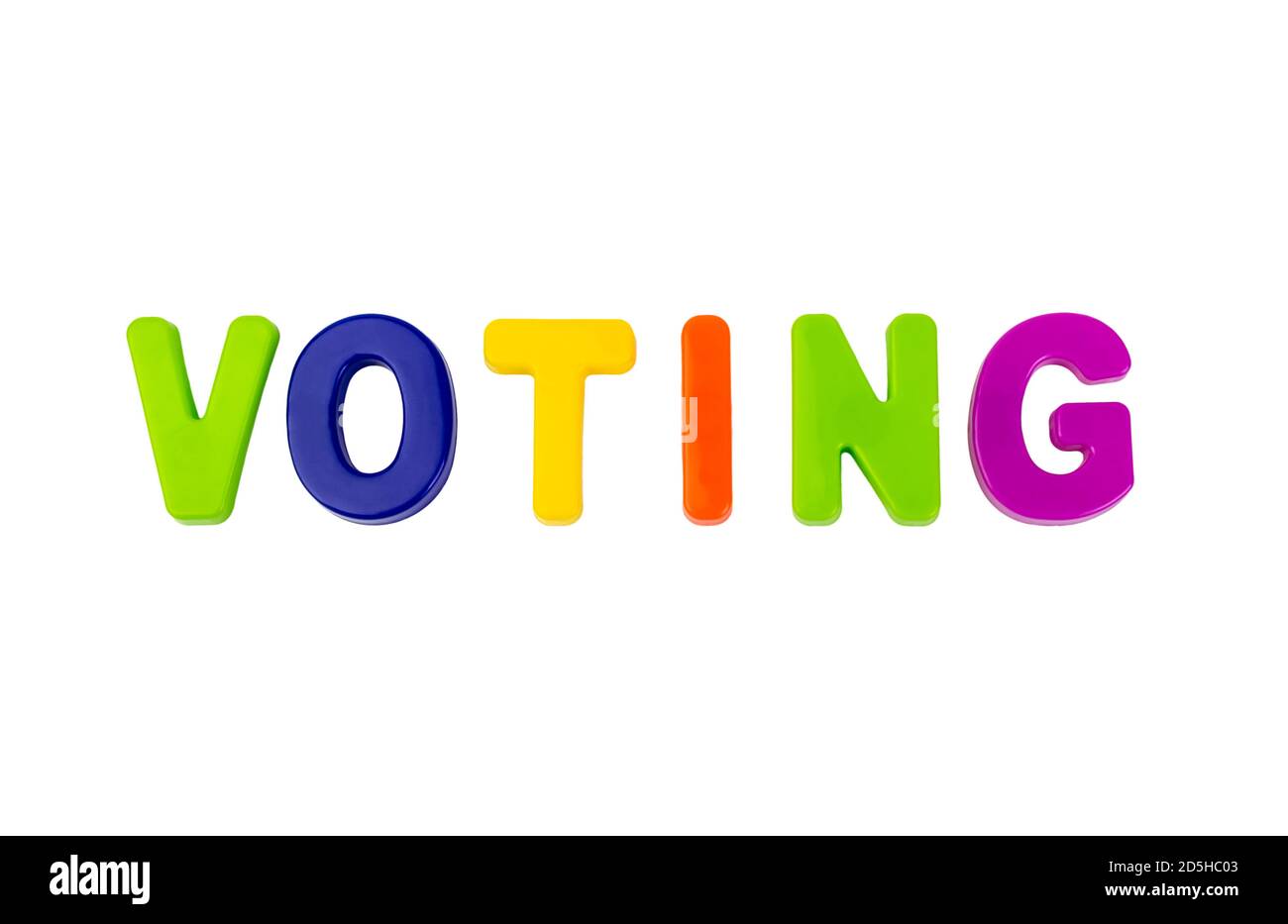 Text VOTING written in plastic letters on a white background. Concept ...
