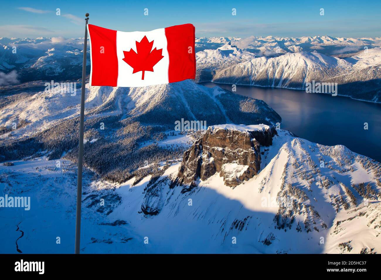 Canadian National Flag Overlay with mountains Stock Photo - Alamy