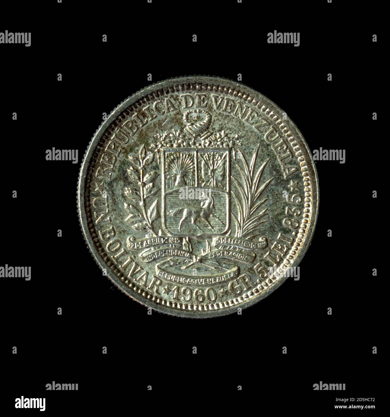 1960 Venezuelan One Bolivar coin isolated on the black background Stock ...