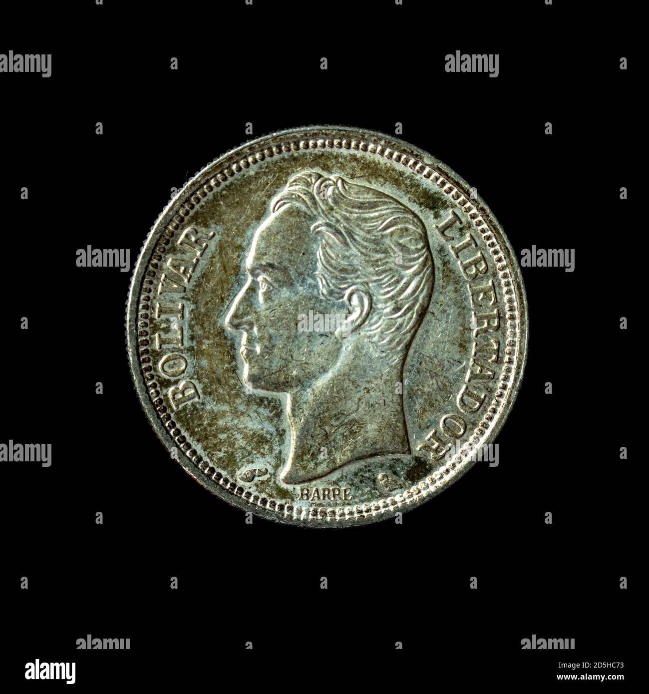 1960 Venezuelan One Bolivar coin isolated on the black background Stock ...