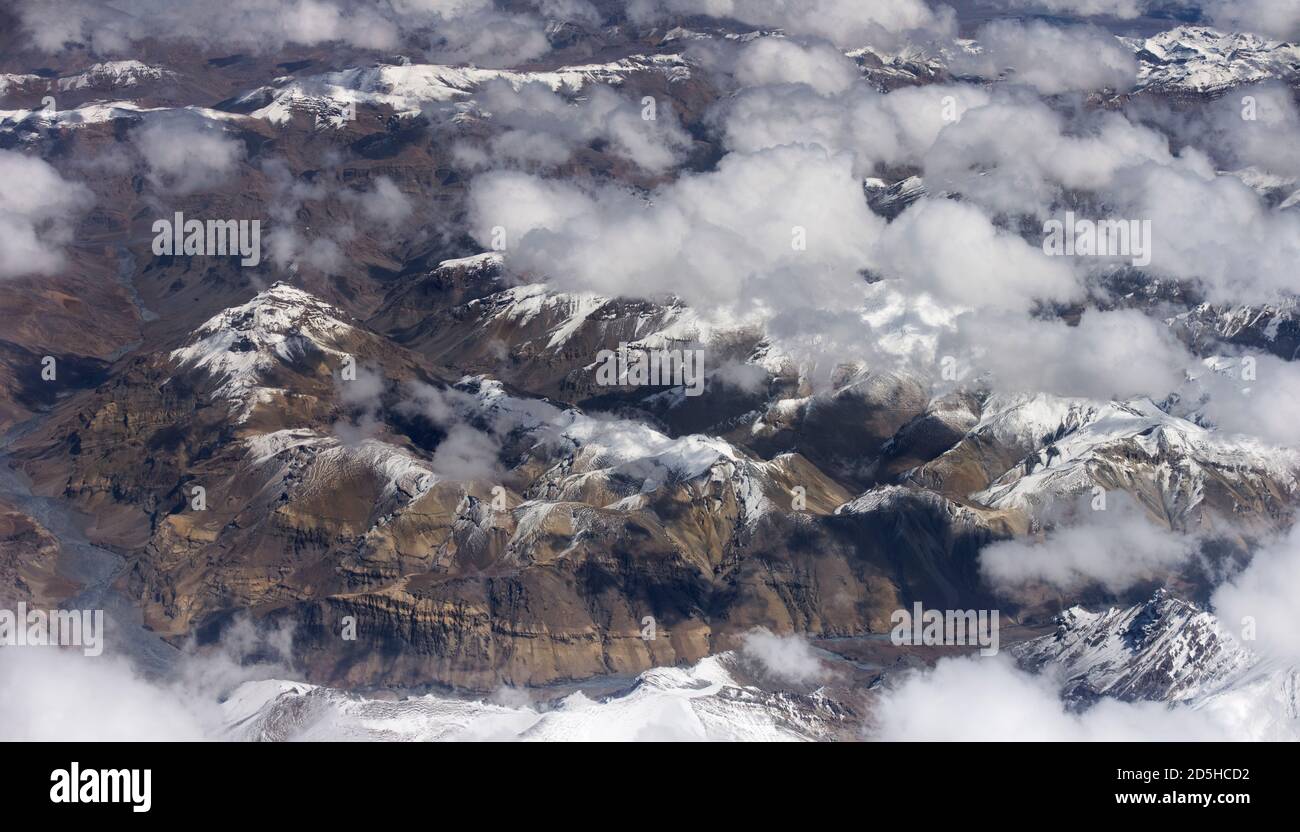 The upper course of the Indus River, aerial view, snow-capped peaks ...