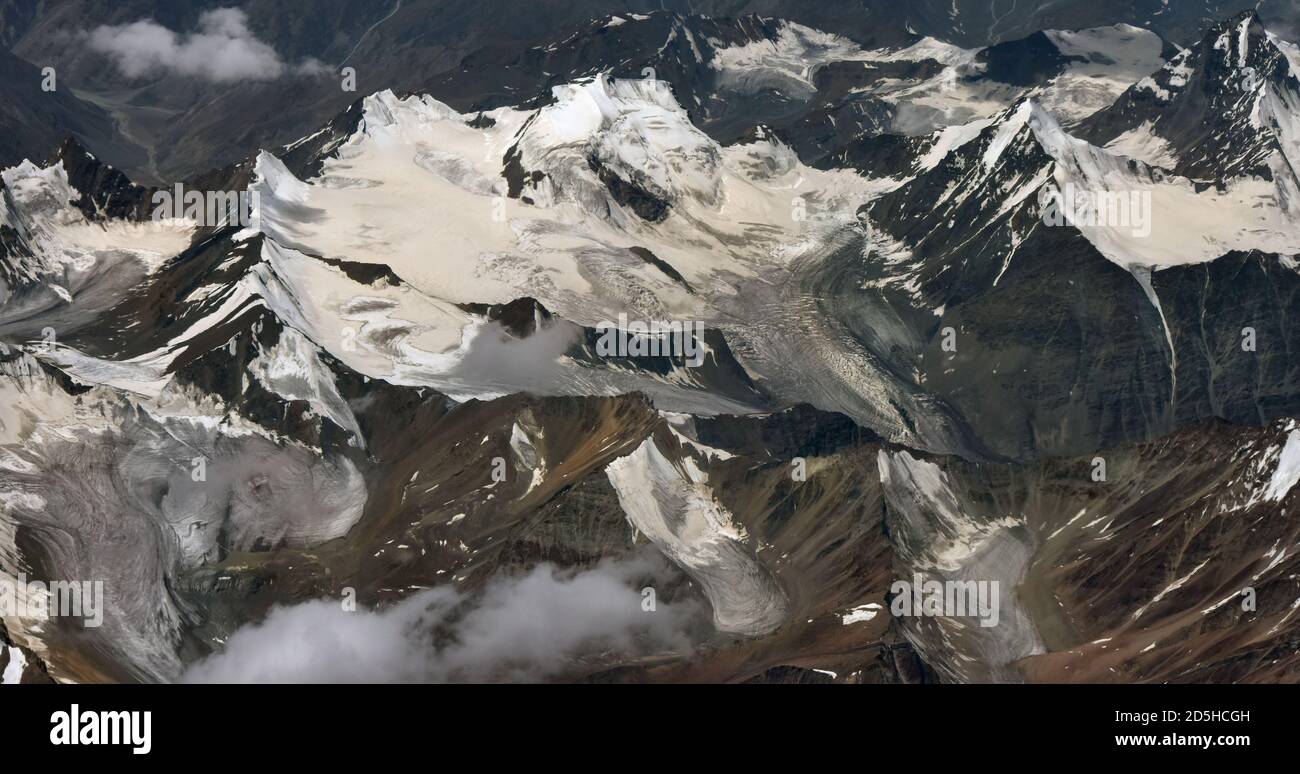 A huge mountain glacier among the high mountain ranges of the Himalayas ...