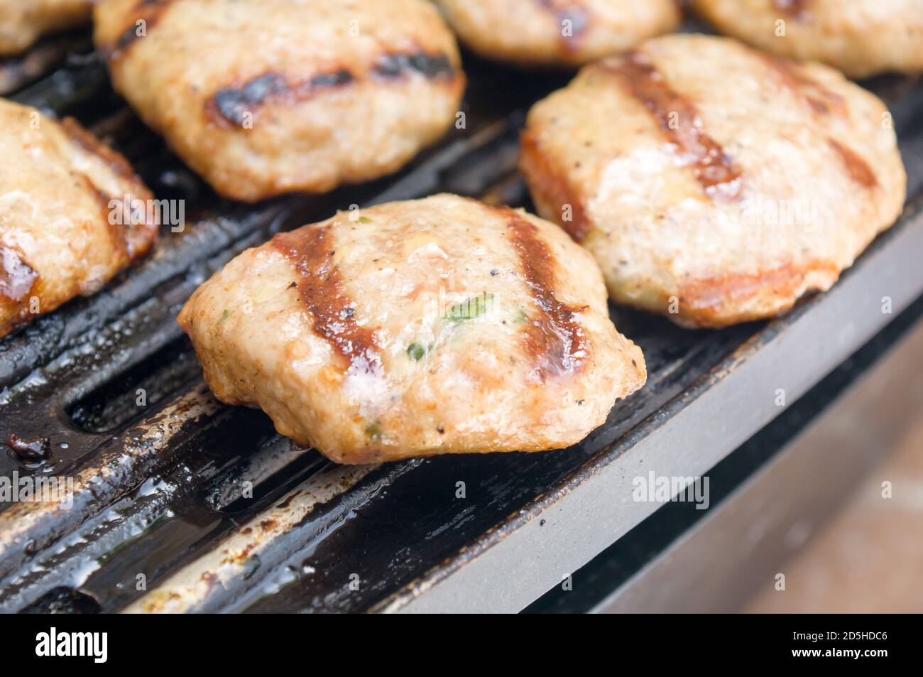 Closeup shot of small pieces of fresh meat getting grilled Stock Photo ...