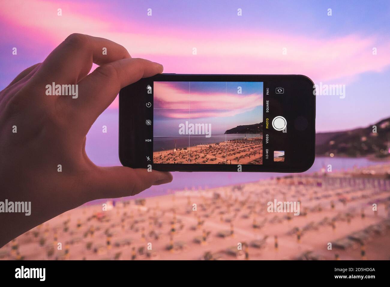 Person taking a picture holding camera hi-res stock photography and ...