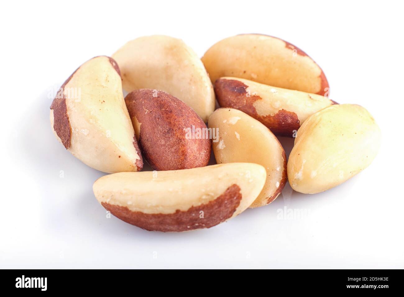 Pile of Brazil nuts isolated on white background. close up Stock Photo ...