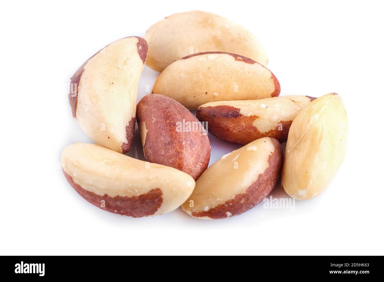 Pile of Brazil nuts isolated on white background. close up Stock Photo ...