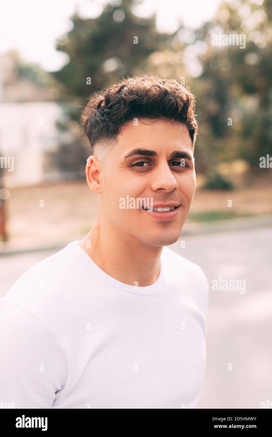 A portrait of a young nice man smiling at the camera Stock Photo - Alamy