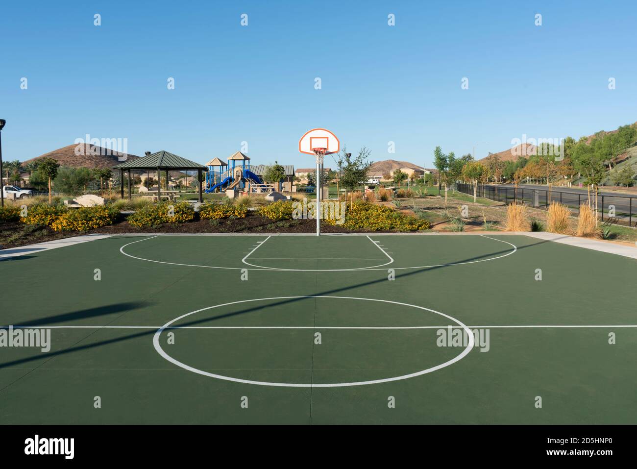Wide angle view of public basketball court Stock Photo - Alamy