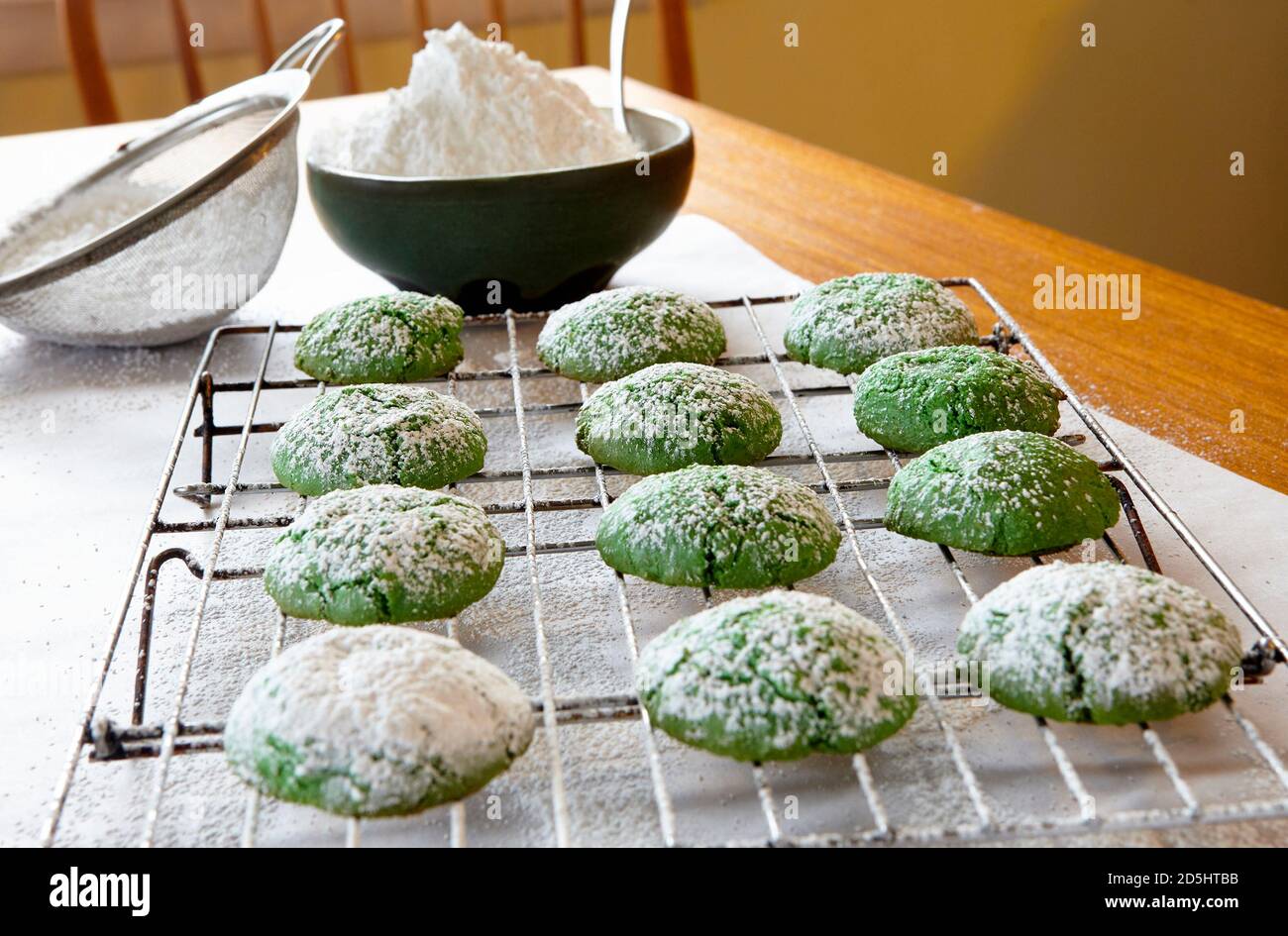 Pistachio cookies with a dusting of powdered sugar Stock Photo - Alamy