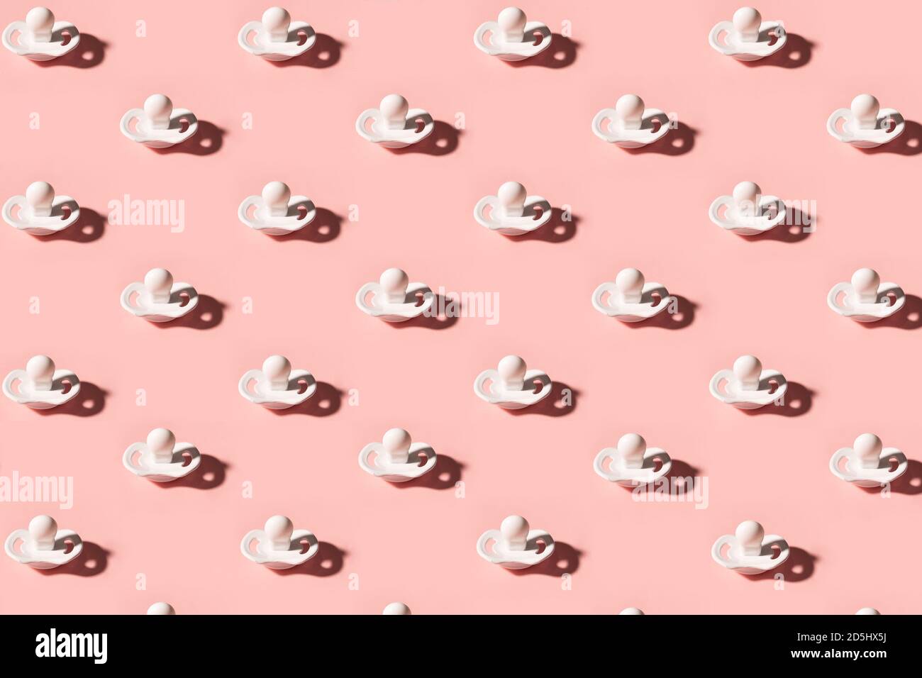 Abstract wallpaper of a pattern made with white baby pacifiers Stock ...