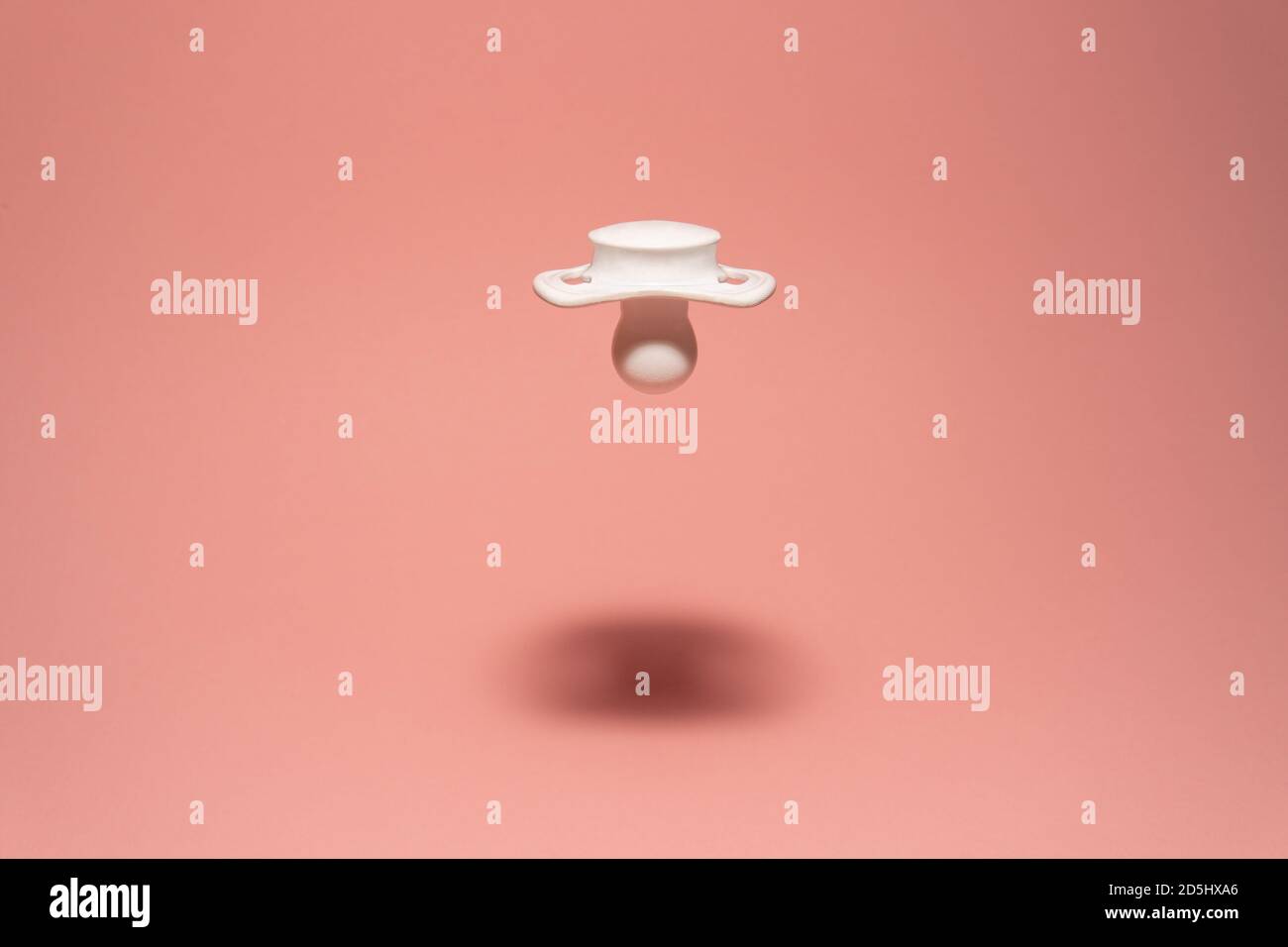 Abstract wallpaper of a white baby pacifier in air Stock Photo - Alamy