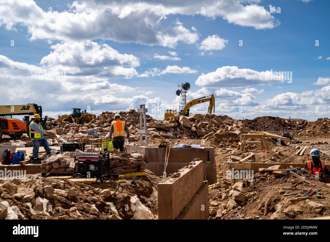 Colorado, USA - September 15, 2020: Construction workers and crew work ...