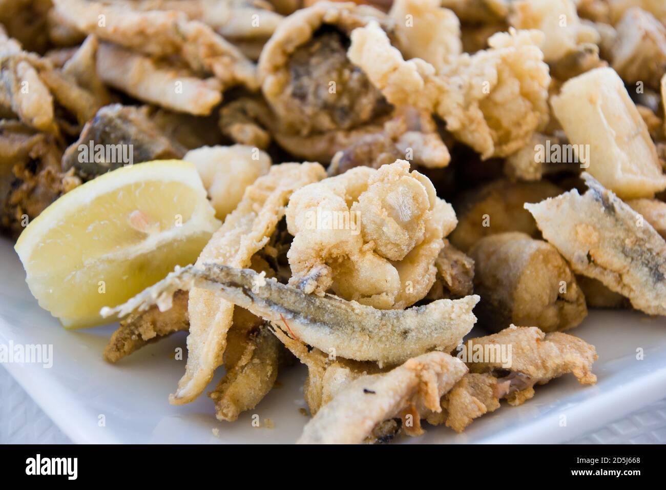 Portion of mixed fried fish Stock Photo - Alamy