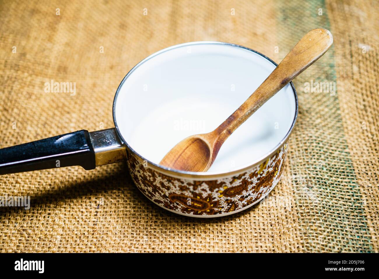 Pot on the fire with wooden spoon hi-res stock photography and images ...