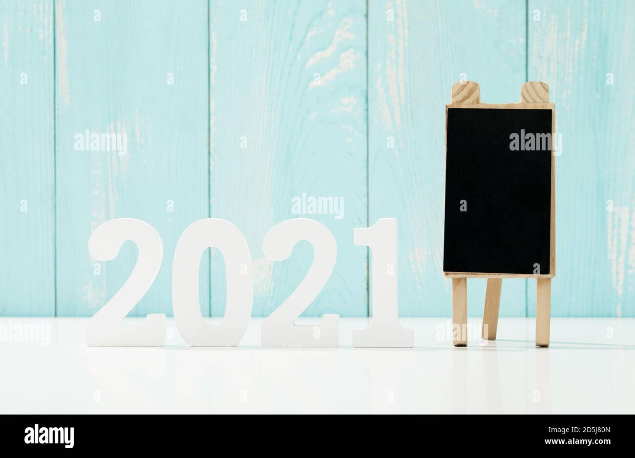 Paper 2021 and a small blackboard with a space for a text Stock Photo ...
