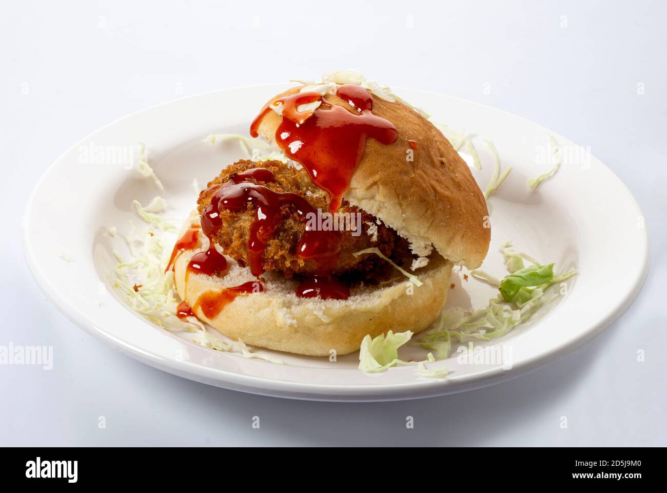 Veg aloo Tikki Burger on white background Stock Photo - Alamy