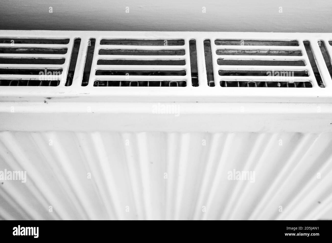 Closeup of a white metal housing of a radiator on a wall Stock Photo ...