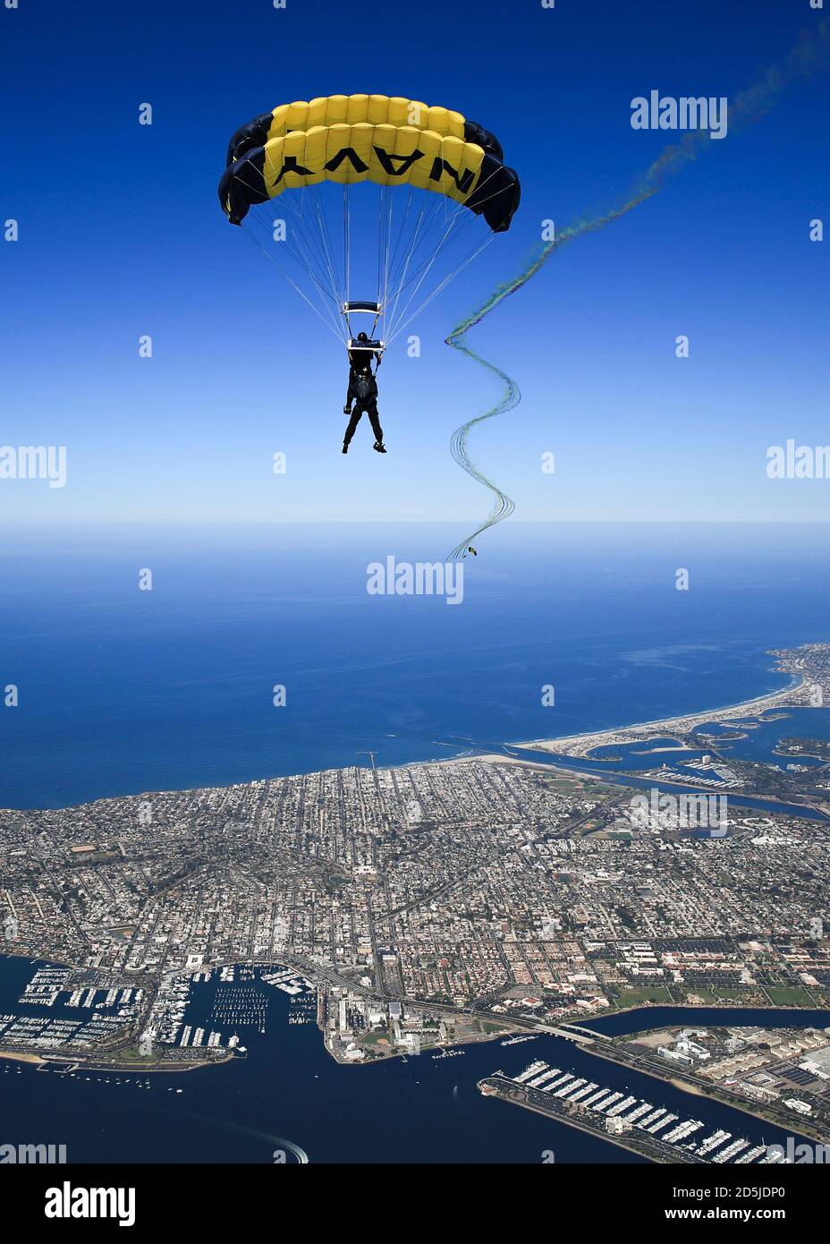 Members of the U.S. Navy Parachute Team, the Leap Frogs, conduct a ...