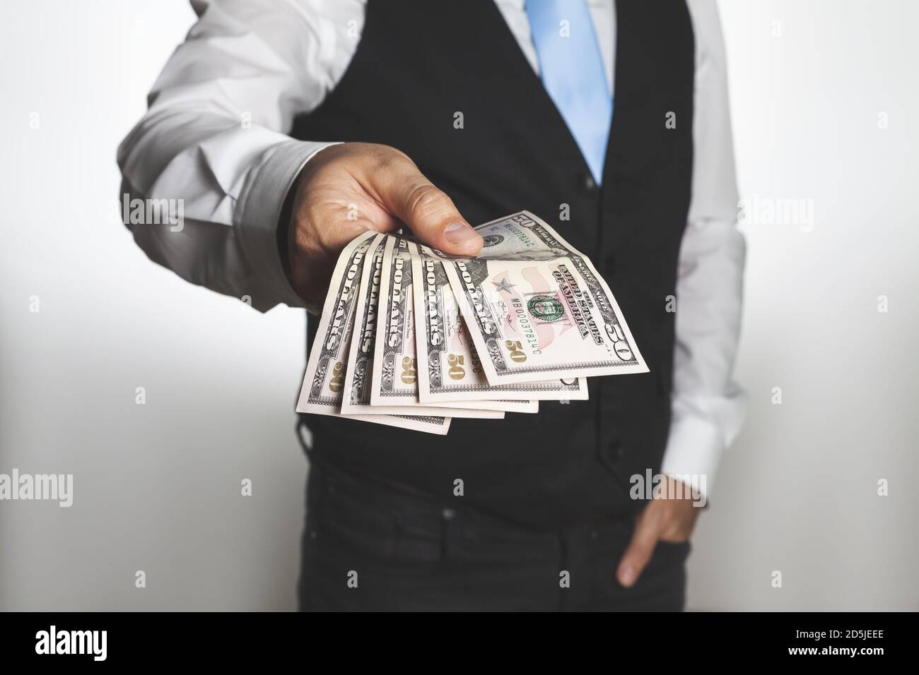 Businessman passing money to the client - the concept of finance ...