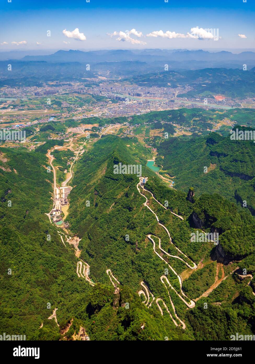 Aerial view of tianmen city with curve road to the mountain, China ...