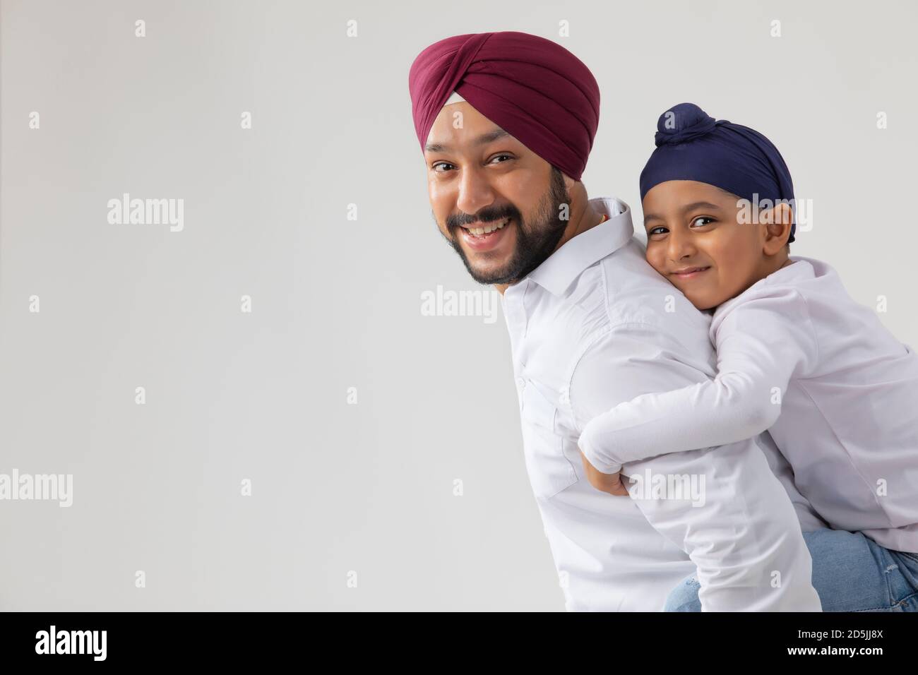 Boy hugging father hi-res stock photography and images - Alamy