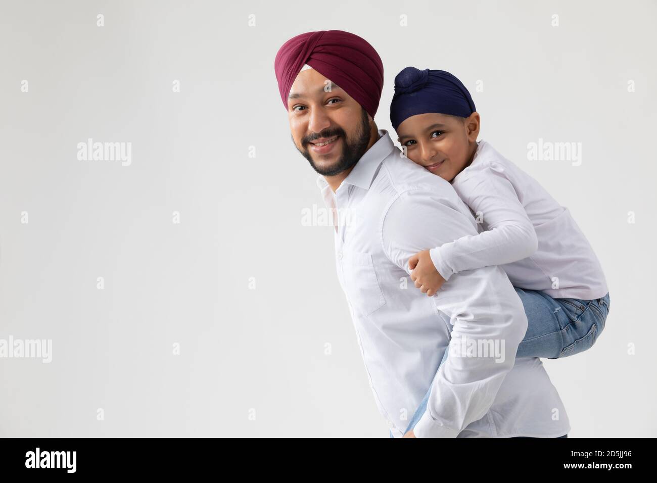 A SIKH SON AND FATHER ENJOYING TIME TOGETHER Stock Photo - Alamy