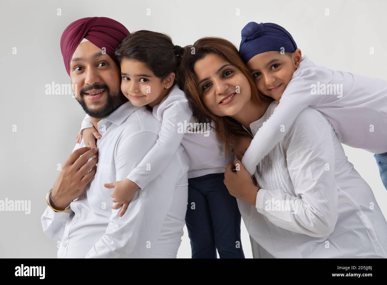 A SIKH FAMILY HAPPILY POSING Stock Photo - Alamy