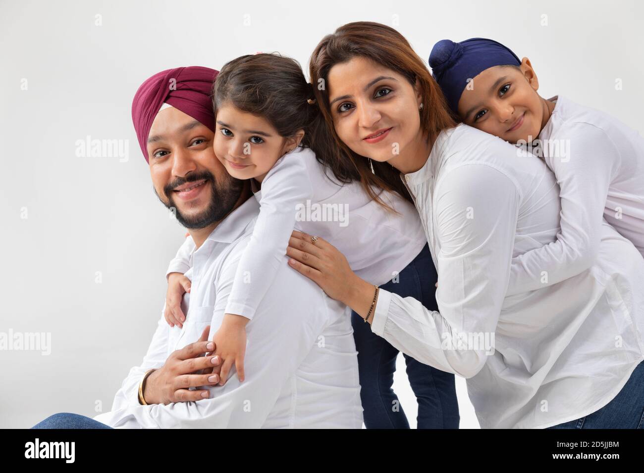 A SIKH FAMILY SPENDING TIME TOGETHER Stock Photo - Alamy