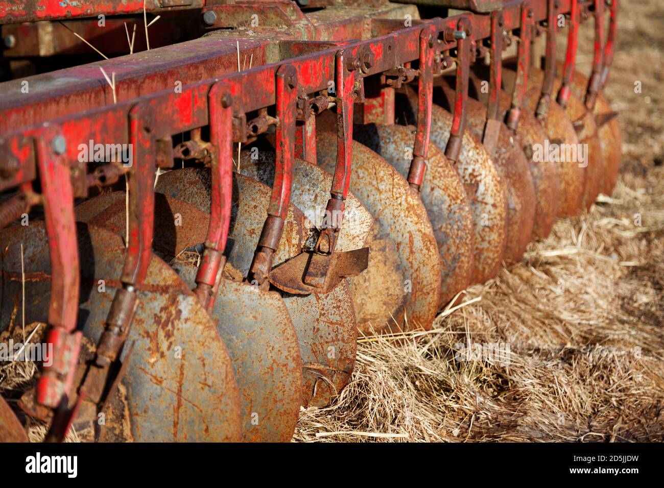 rusty disc-shaped knives for a large plow machine Stock Photo - Alamy