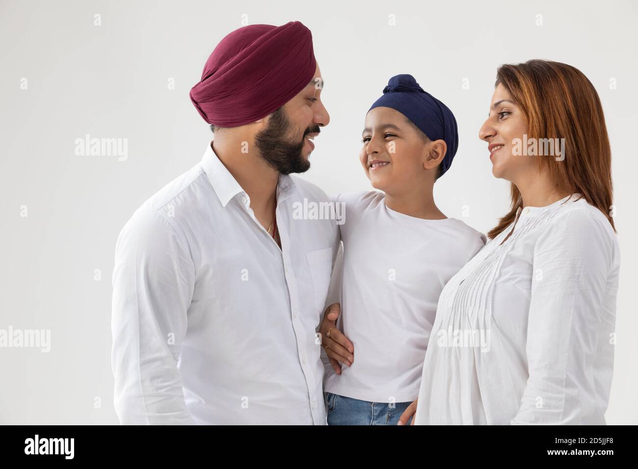 A SIKH PARENTS AND CHILD SPENDING TIME TOGETHER Stock Photo - Alamy