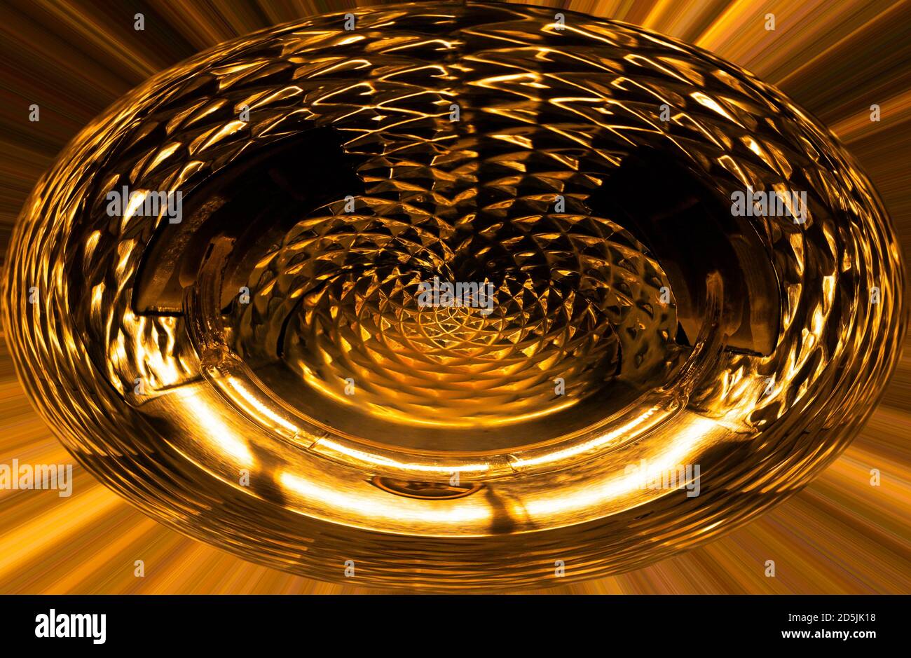 Abstract glass crystal vase with distortions in gold colors Stock Photo ...