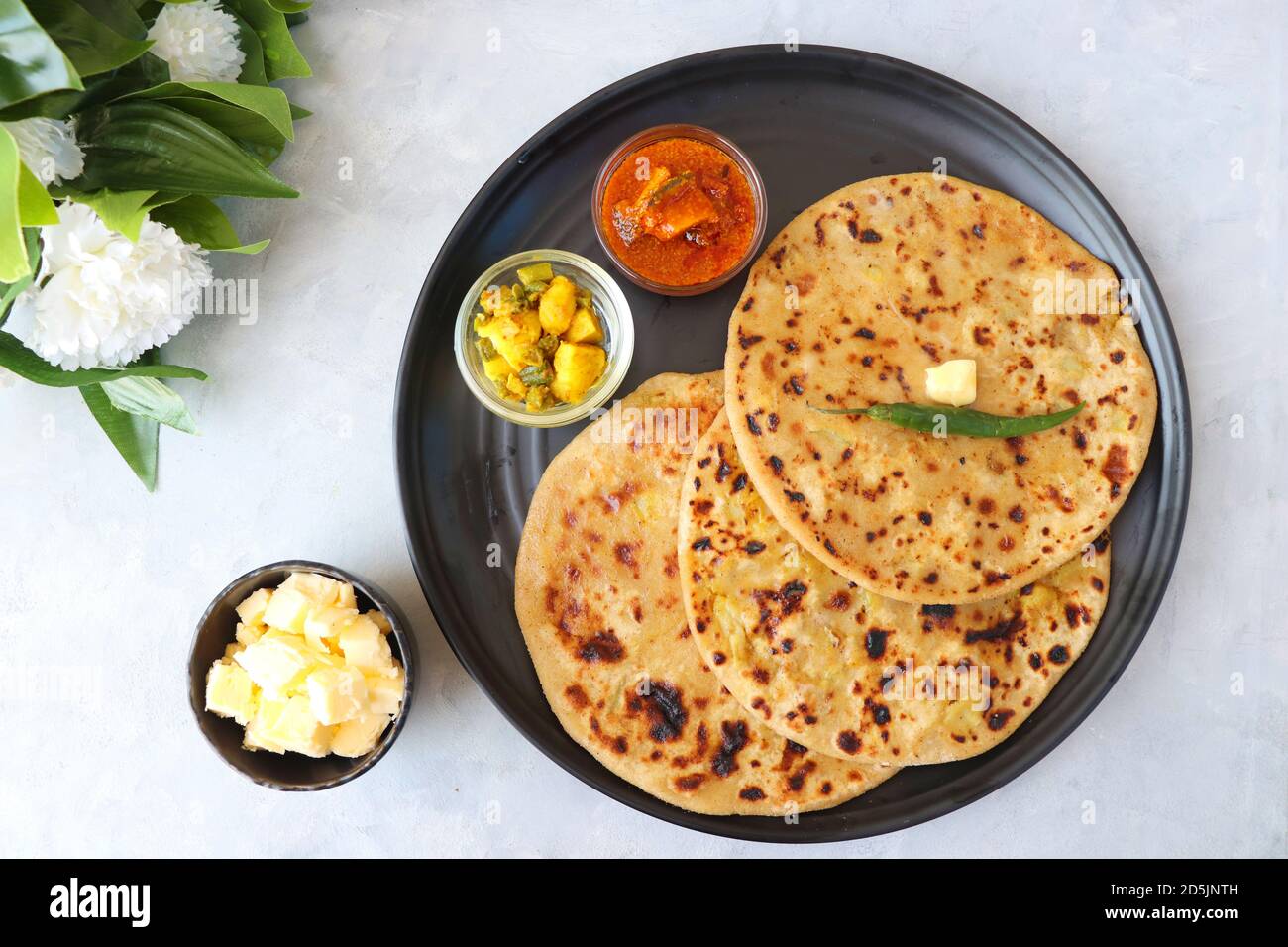 Aloo / Alu Paratha or Indian Potato stuffed Flatbread. Served with ...