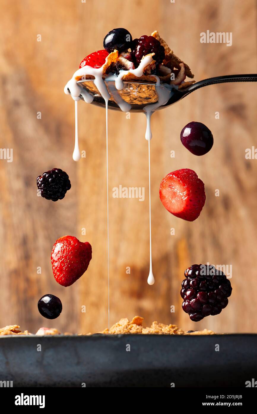 Breakfast cereal with pink lady apple, flame raisin fruit, flakes and ...